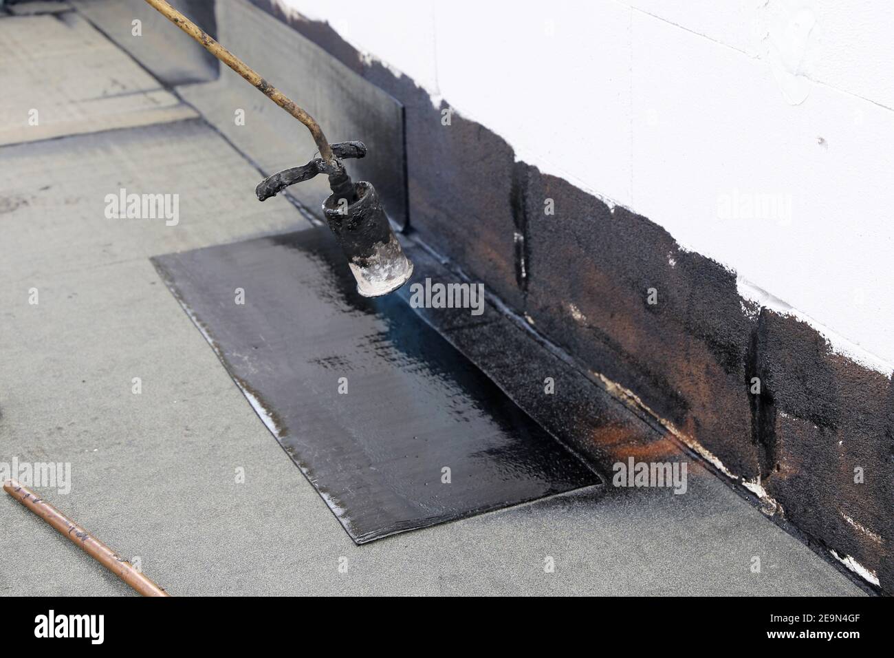 Professional flat roof waterproofing with bitumen welded sheeting Stock ...