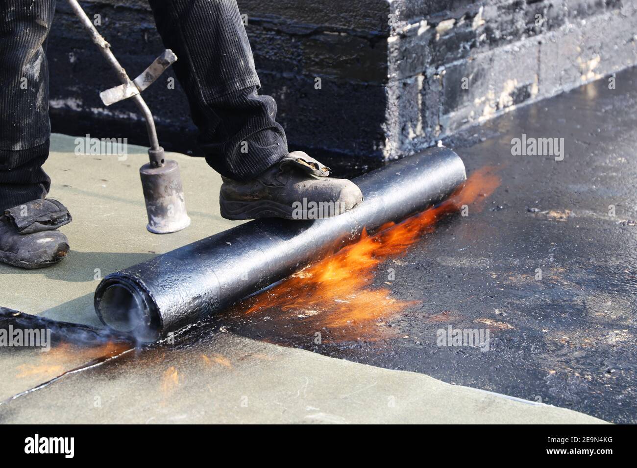 Professional flat roof waterproofing with bitumen welded sheeting Stock ...