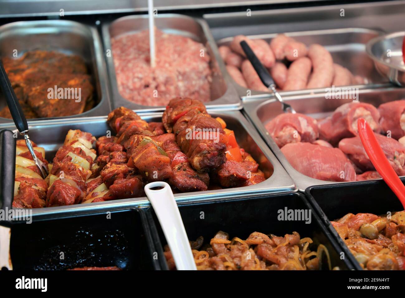 Variety of fine meat products in the butchery Stock Photo - Alamy