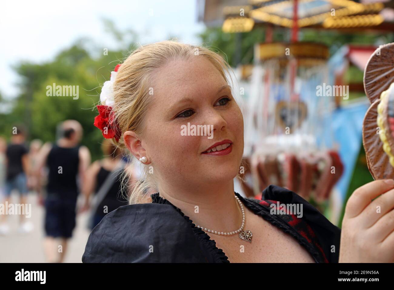 Woman with traditional german costume at a (german) fair (model ...