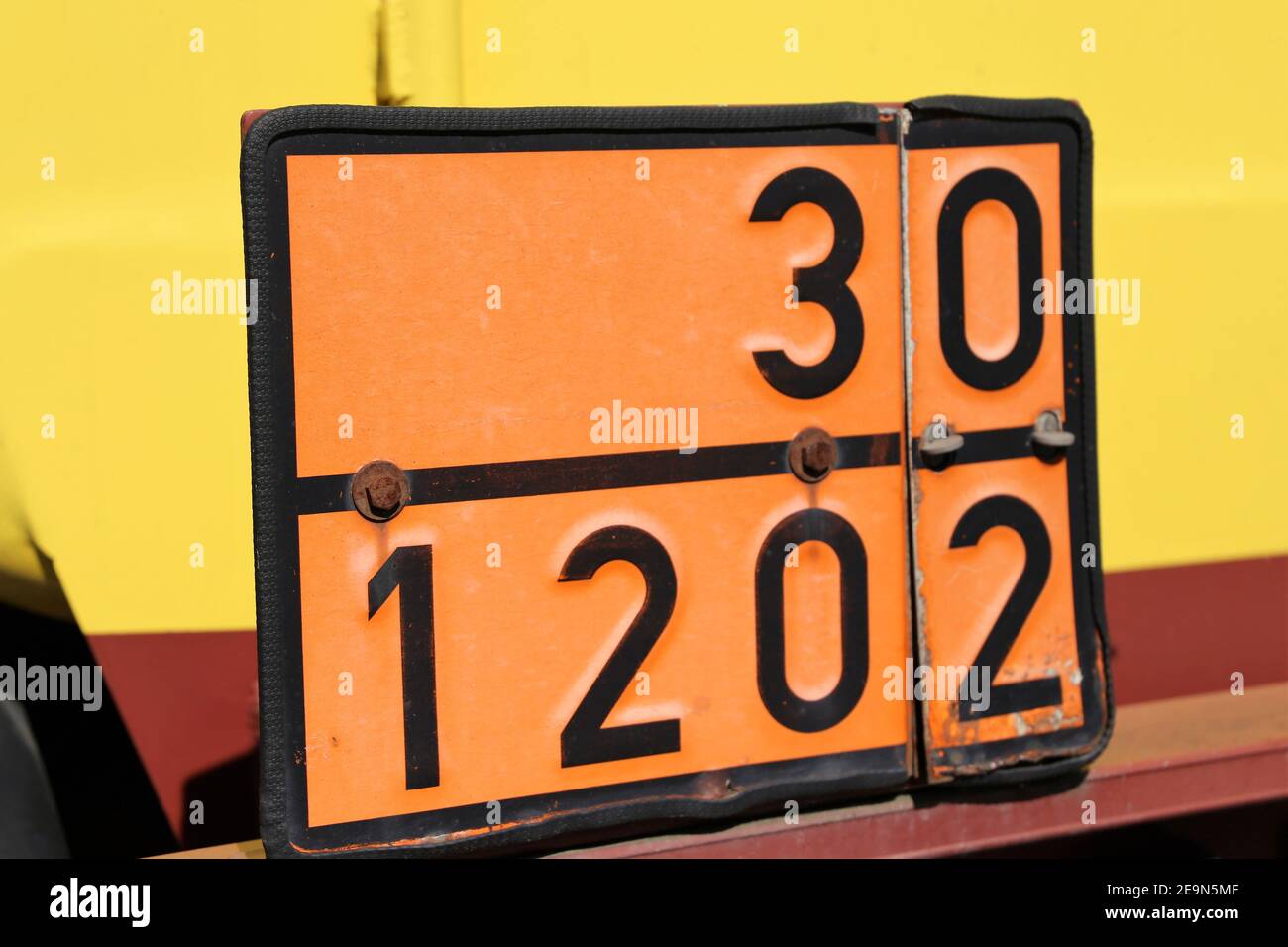 Truck with dangerous goods. Close up of a warning sign on a truck. 30/ ...