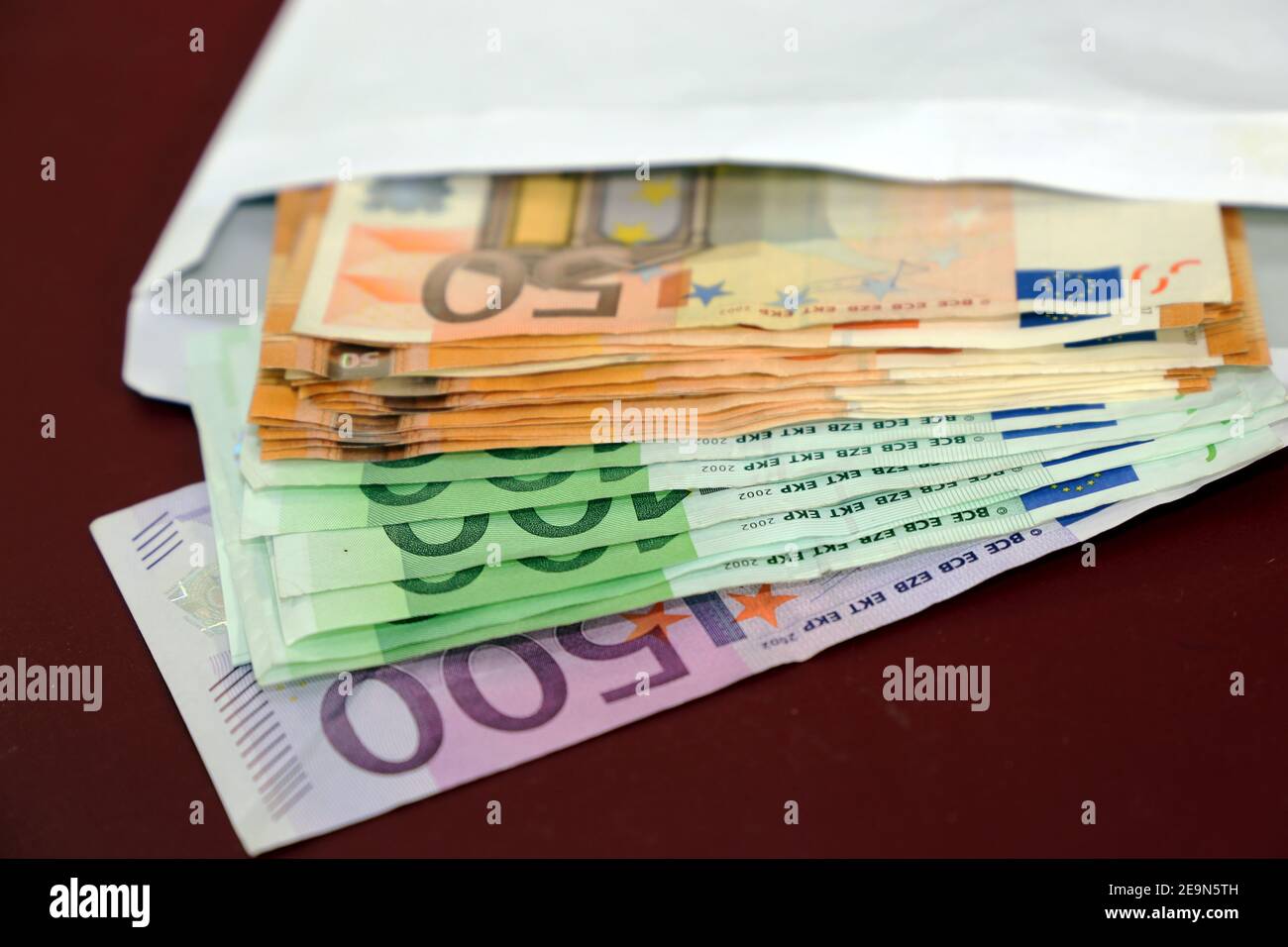 Envelope with Euro bank notes Stock Photo - Alamy