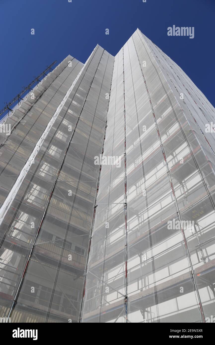 Scaffolding: Scaffolded high rise building (Germany Stock Photo - Alamy