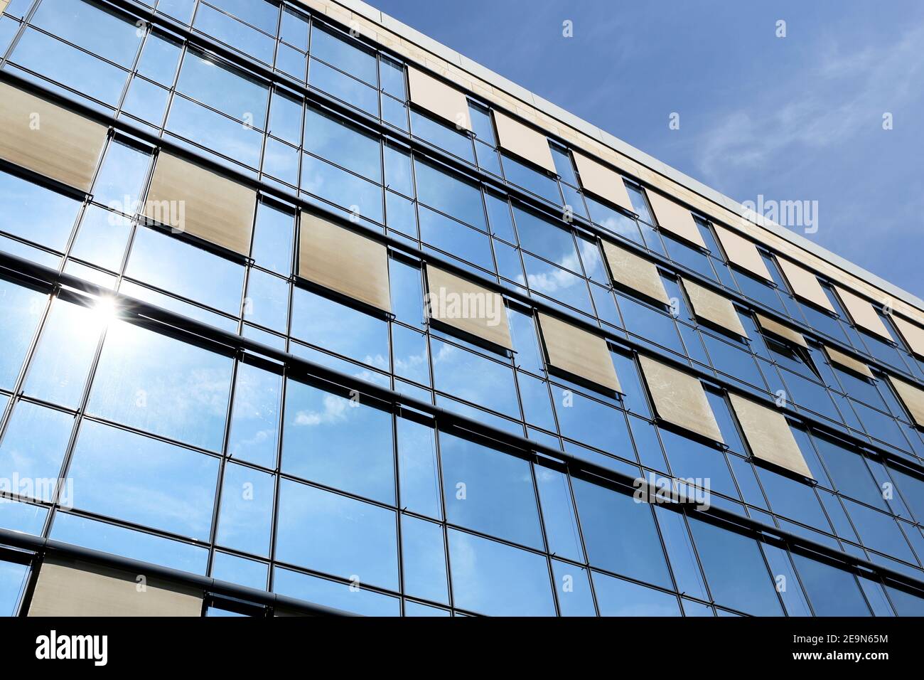 Building with large and modern glass facade Stock Photo - Alamy