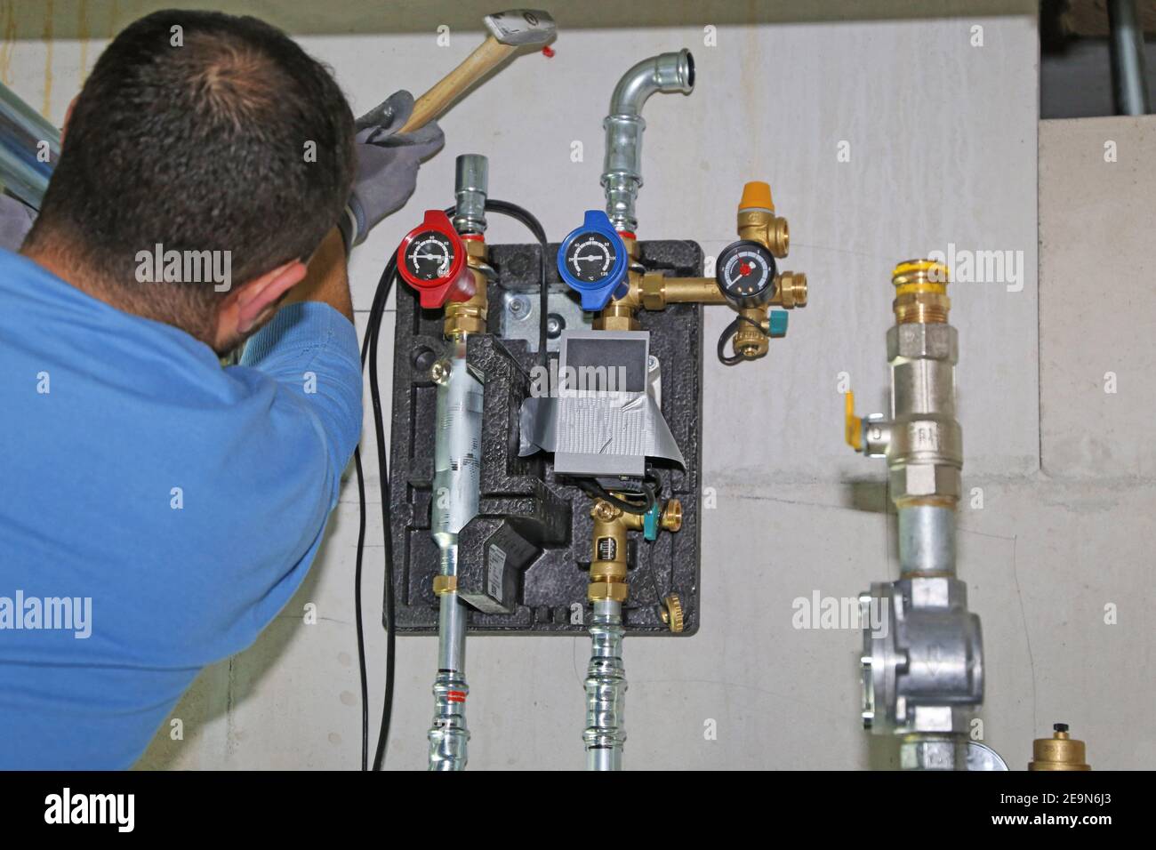 Installation of a heating system in a residential building Stock Photo ...