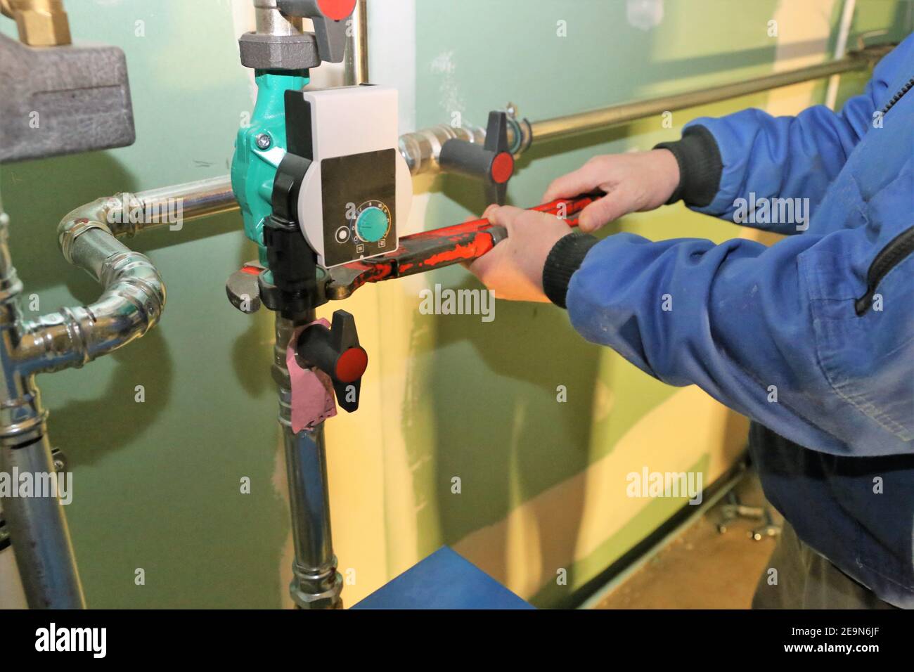 Installation of a heating system in a residential building Stock Photo ...