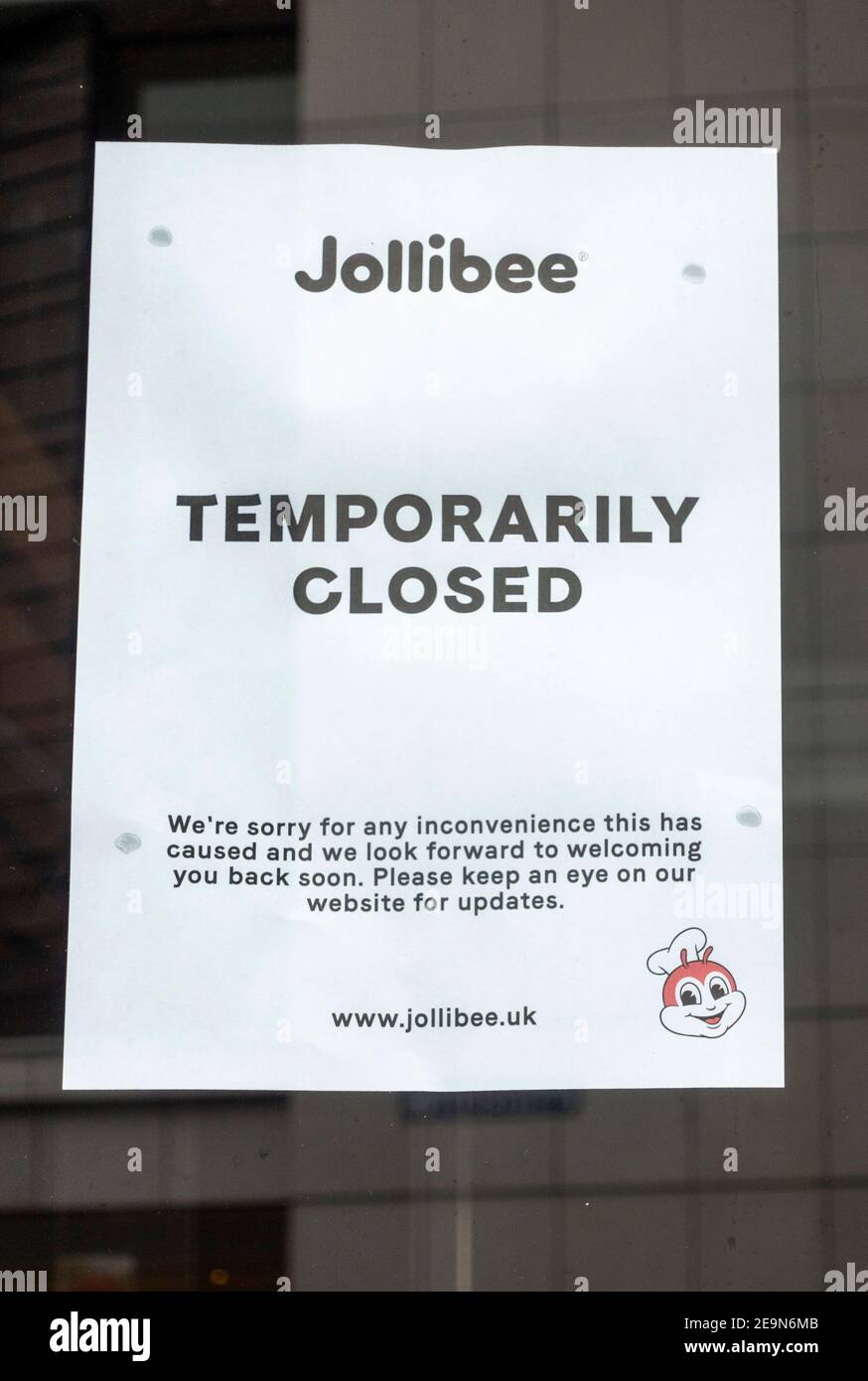 Jollibee Asian chicken restaurant sign saying closed temporarily for ...