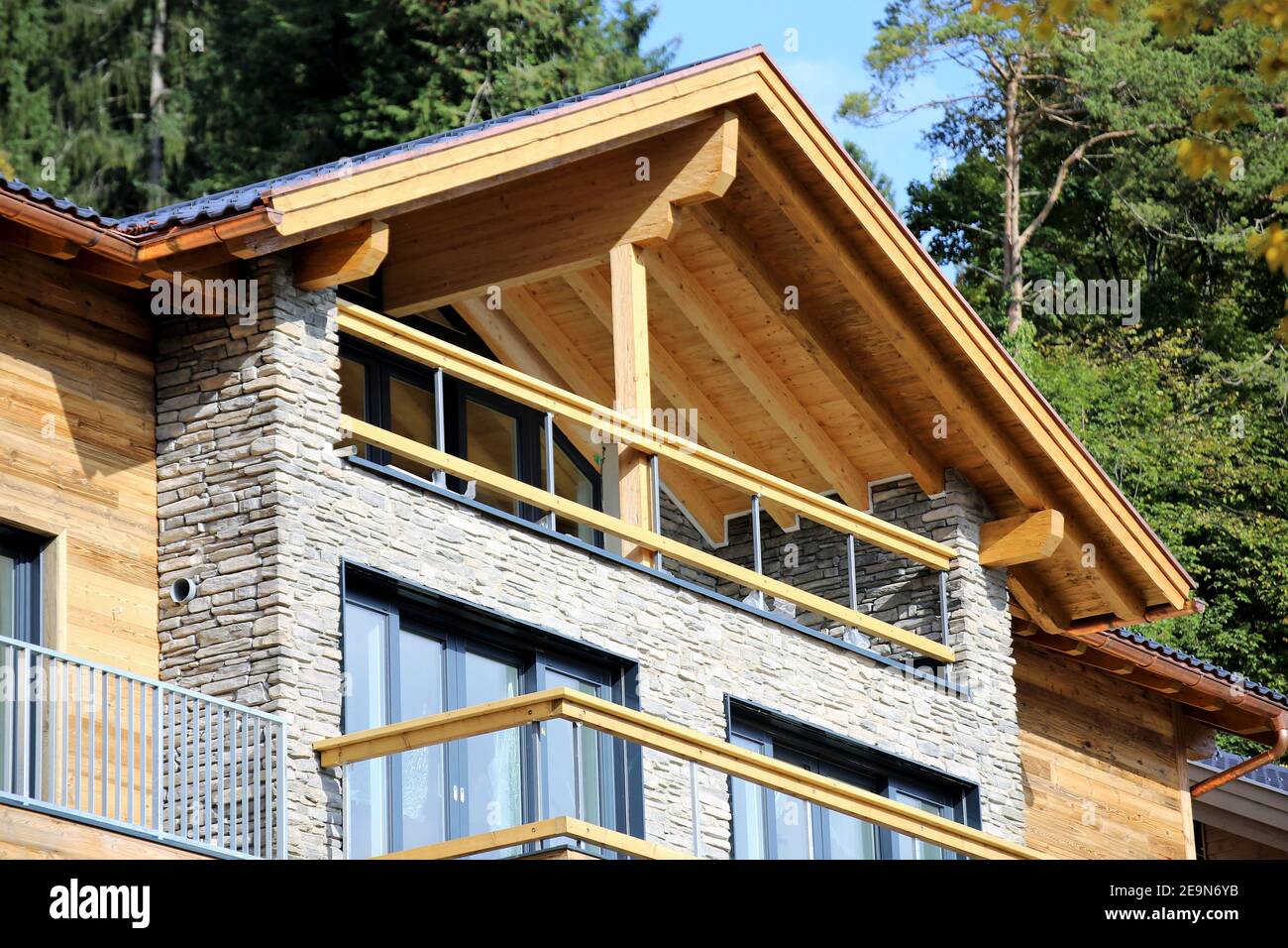 Residential home with wooden facade Stock Photo - Alamy