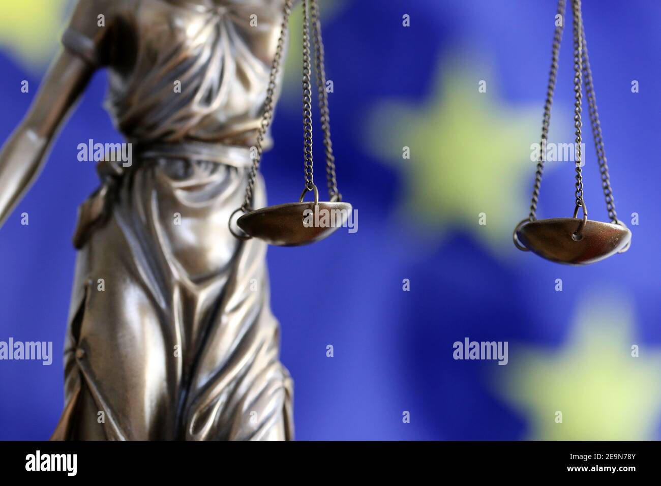 Symbol image: Justitia in front of a Europe flag Stock Photo - Alamy