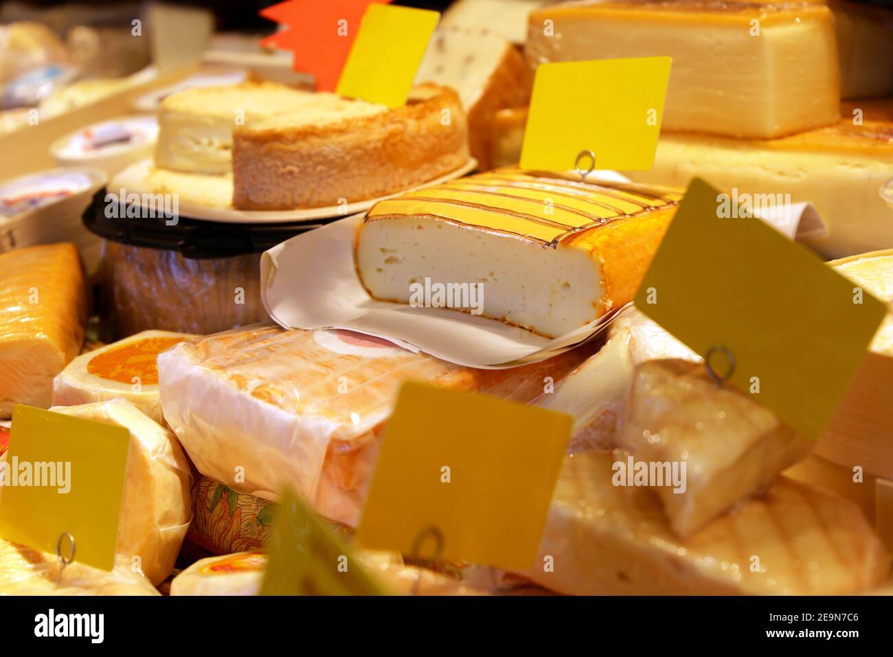 Variation of different types of cheese in the supermarket Stock Photo ...