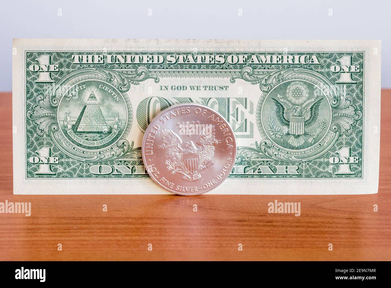 Paper one dollar and 1oz fine silver one dollar (Bullion Coin). 1 ...