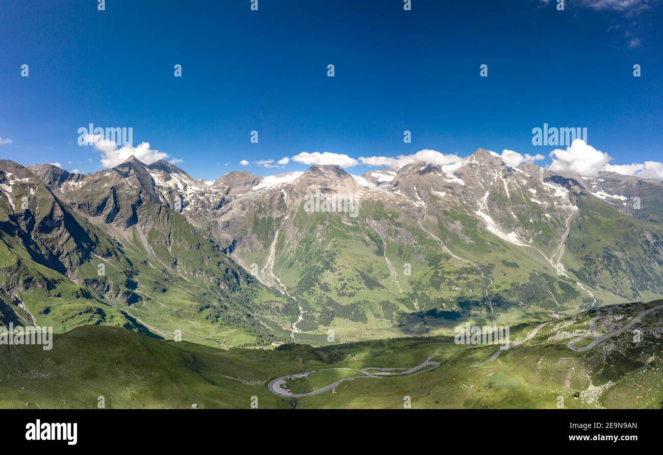 Aerial view of Grossglockner mountain range with serpentine Taxenbacher ...