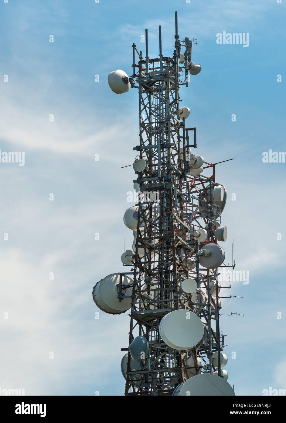 Iron Telecommunication tower with group of parabolic antennas Stock ...