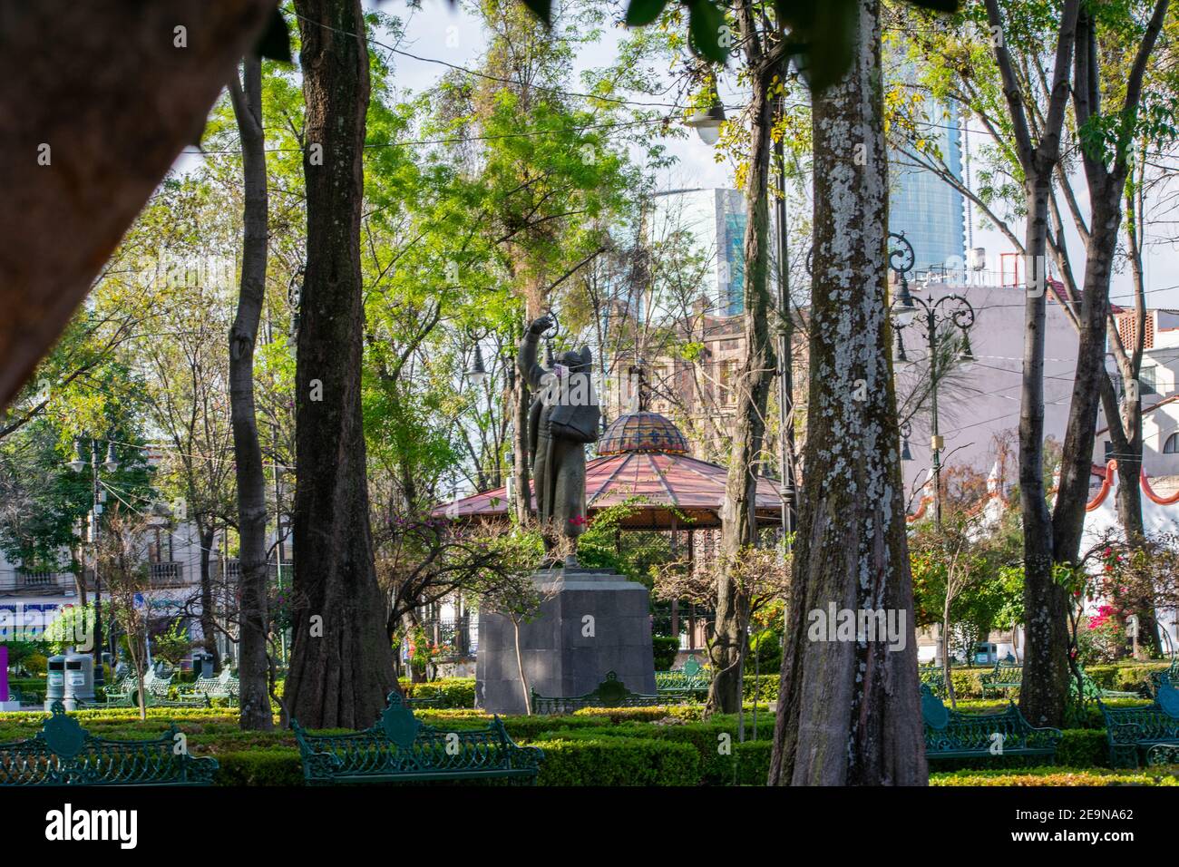 Statue of Mexican historical figure wearing face masks in park Stock ...