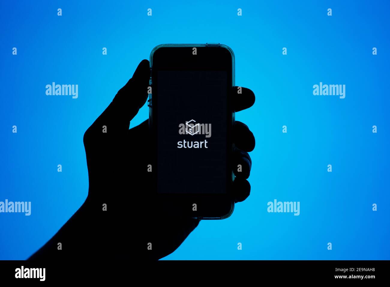 In this photo illustration the Stuart logo seen displayed on a ...