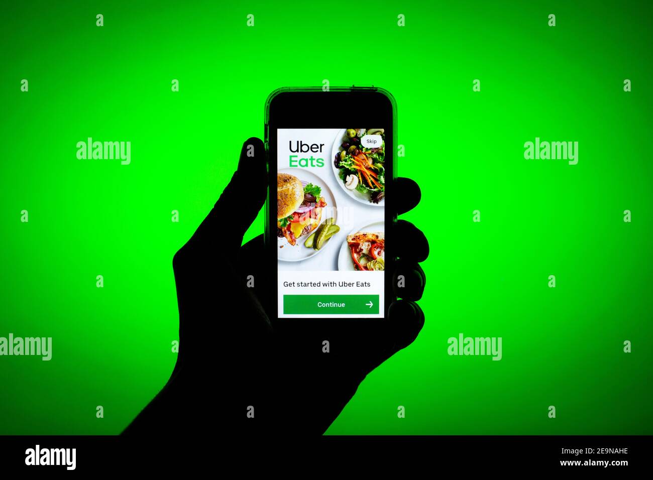 In this photo illustration the Uber Eats App seen displayed on a ...