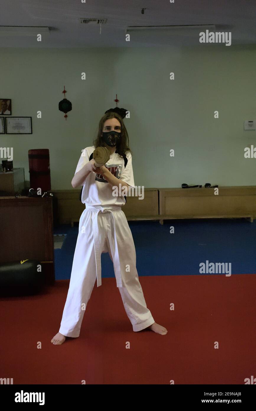 This action photo is of my son in his Karate class. Karate is a martial ...