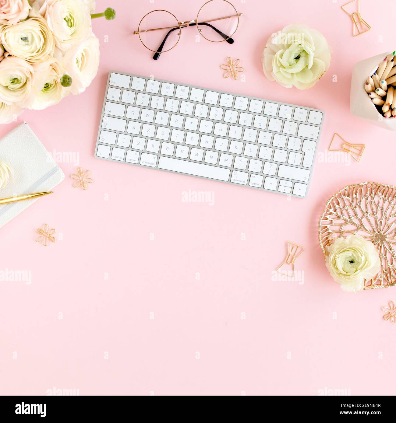 Stylized, pink women's home office desk. Workspace with computer ...