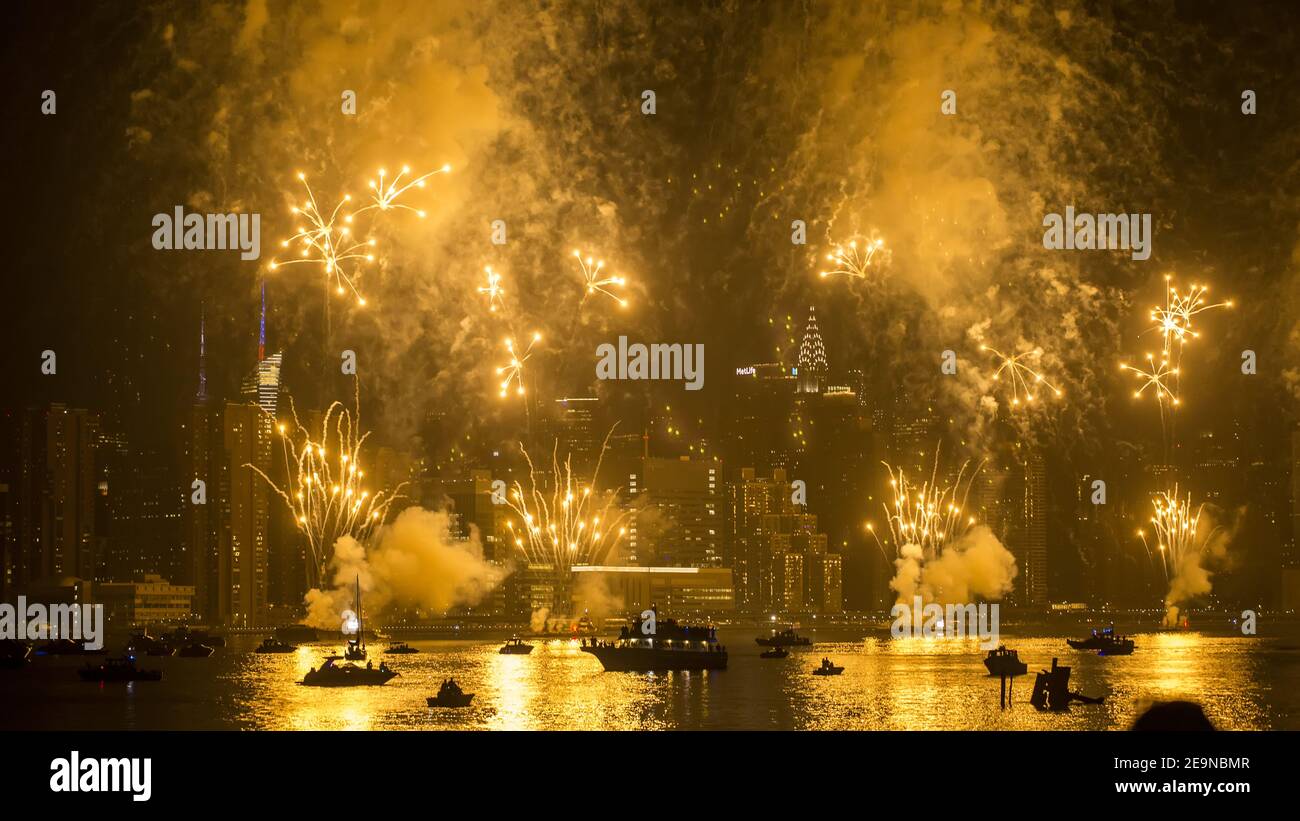 Strobe type fireworks exploded in the background of the Manhattan ...