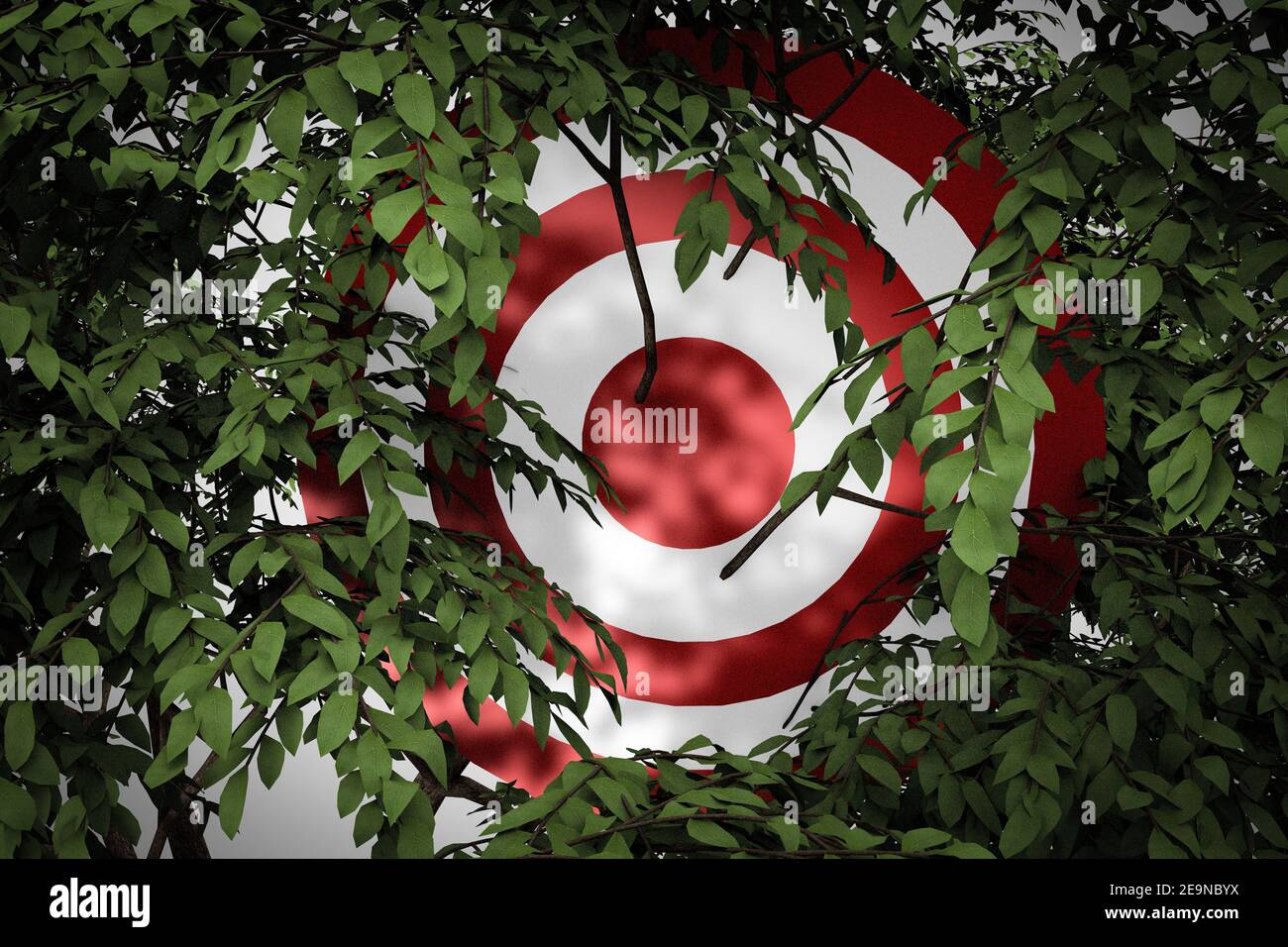 Leaves of the tree hide a target demonstrating profit goals or clear ...