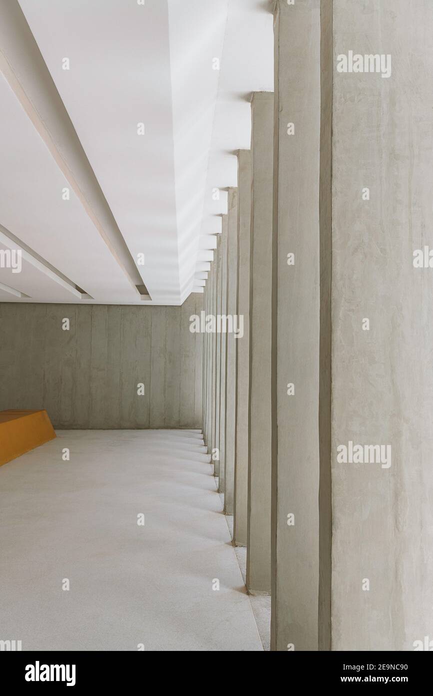 Building columns with lateral sunlight Stock Photo - Alamy