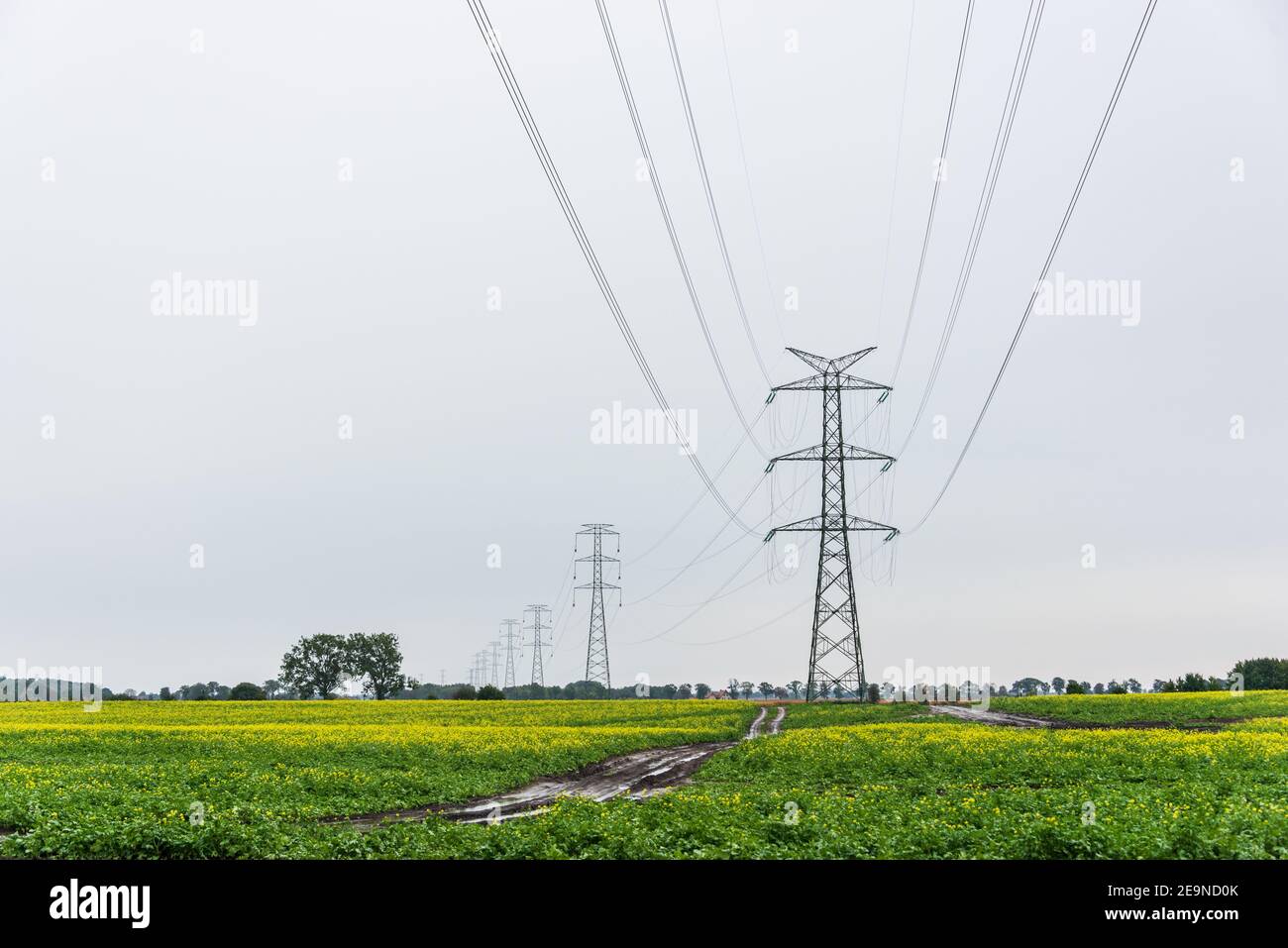 Extra-high voltage 400 kV overhead power line on large pylons, used for ...