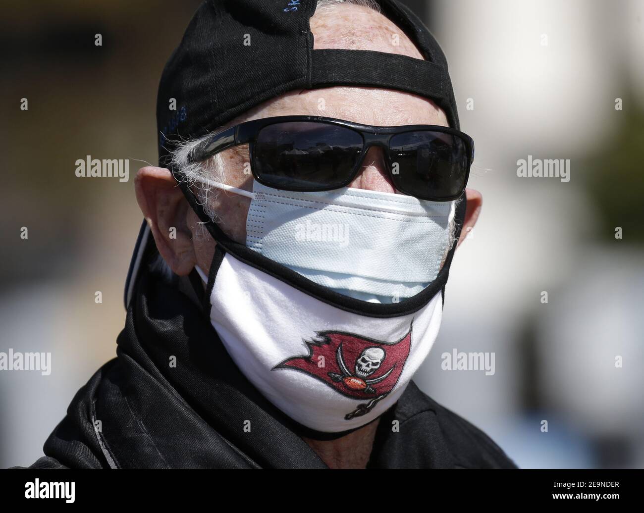 Tampa, United States. 05th Feb, 2021. A fan wears two face masks at the ...