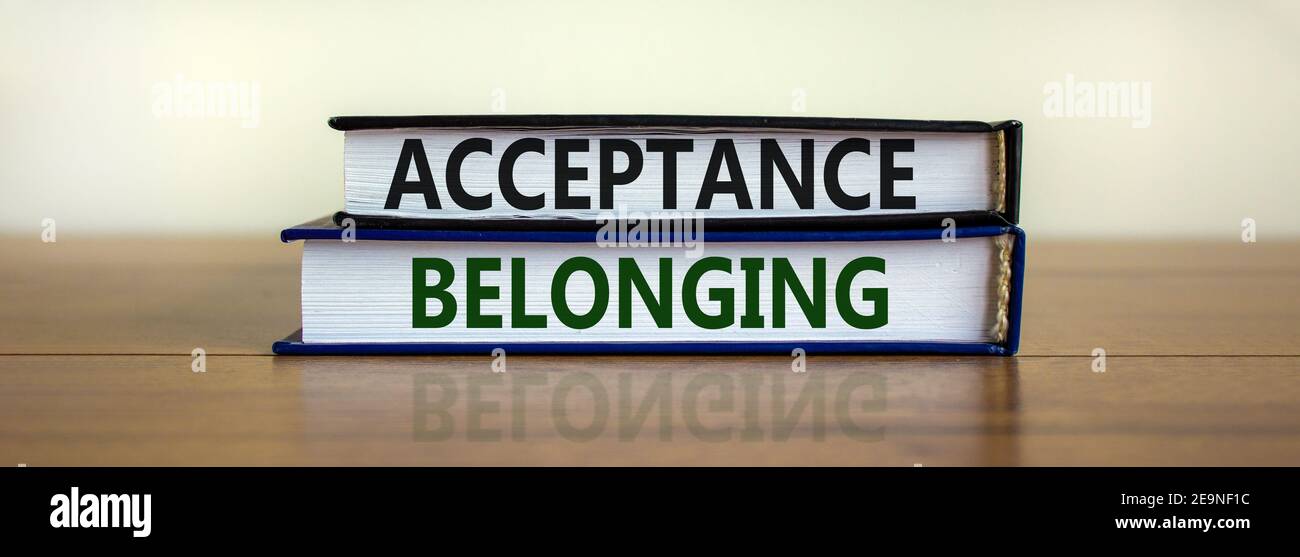 Acceptance and belonging symbol. Books with words 'acceptance and ...