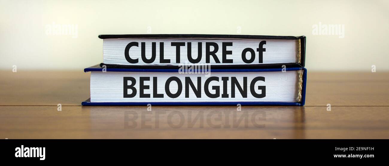 Culture of belonging symbol. Books with words 'culture of belonging' on ...