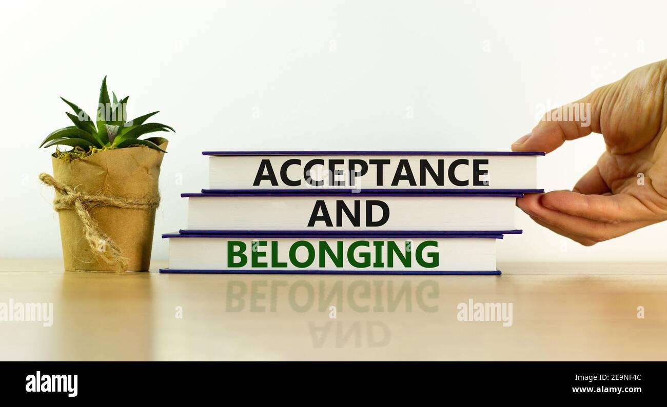 Acceptance and belonging symbol. Books with words 'acceptance and ...