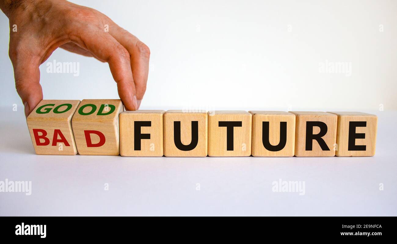 Good or bad future symbol. Businessman turns wooden cubes and changes ...