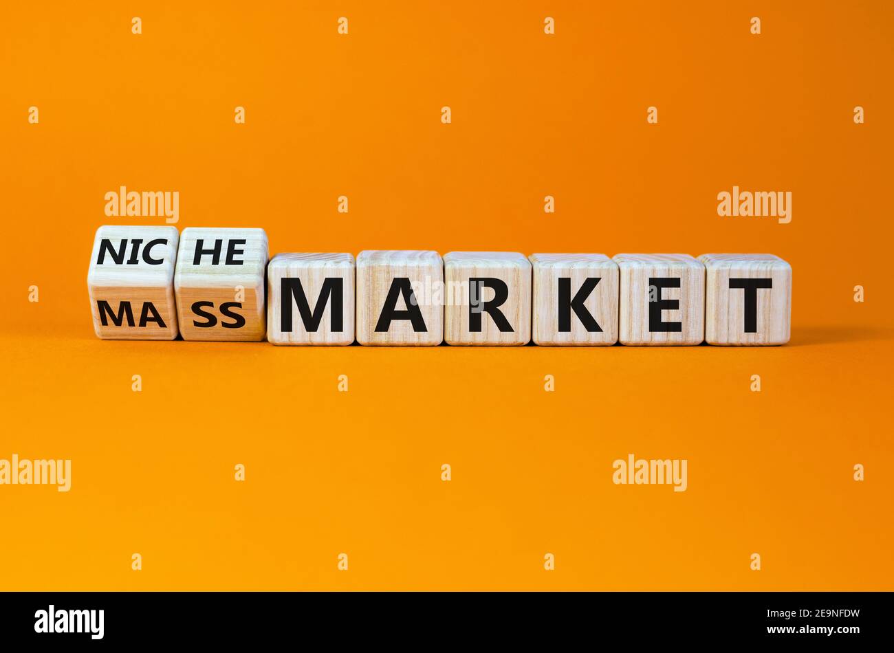 Mass or niche market symbol. Turned wooden cubes and changed words ...