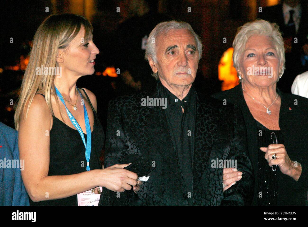 Singer Charles Aznavour flanked by daughter Katia and French singer ...