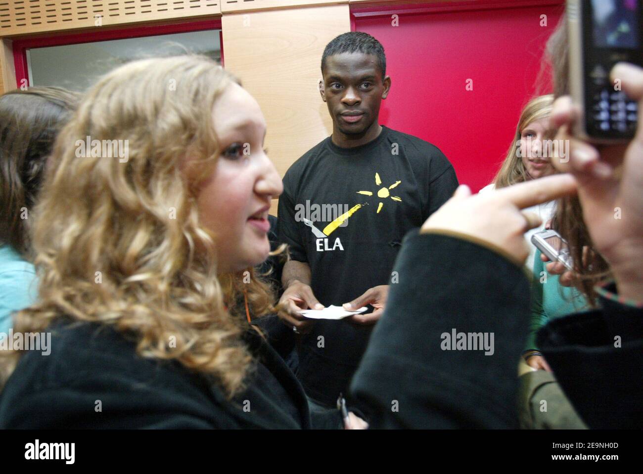 French football player Louis Saha poses in a school, Paris, France, on ...