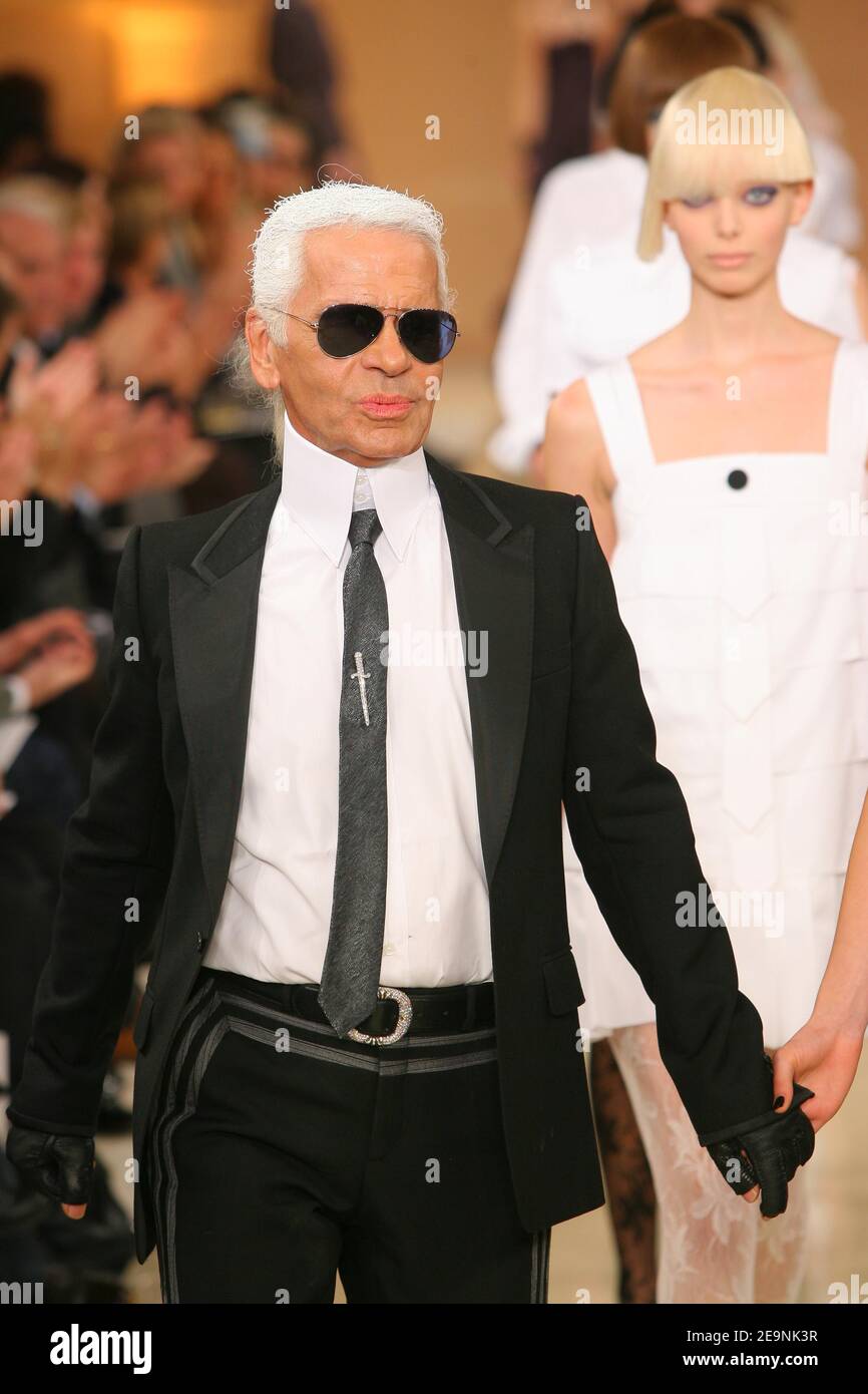 German fashion designer Karl Lagerfeld appears on the catwalk after his ...