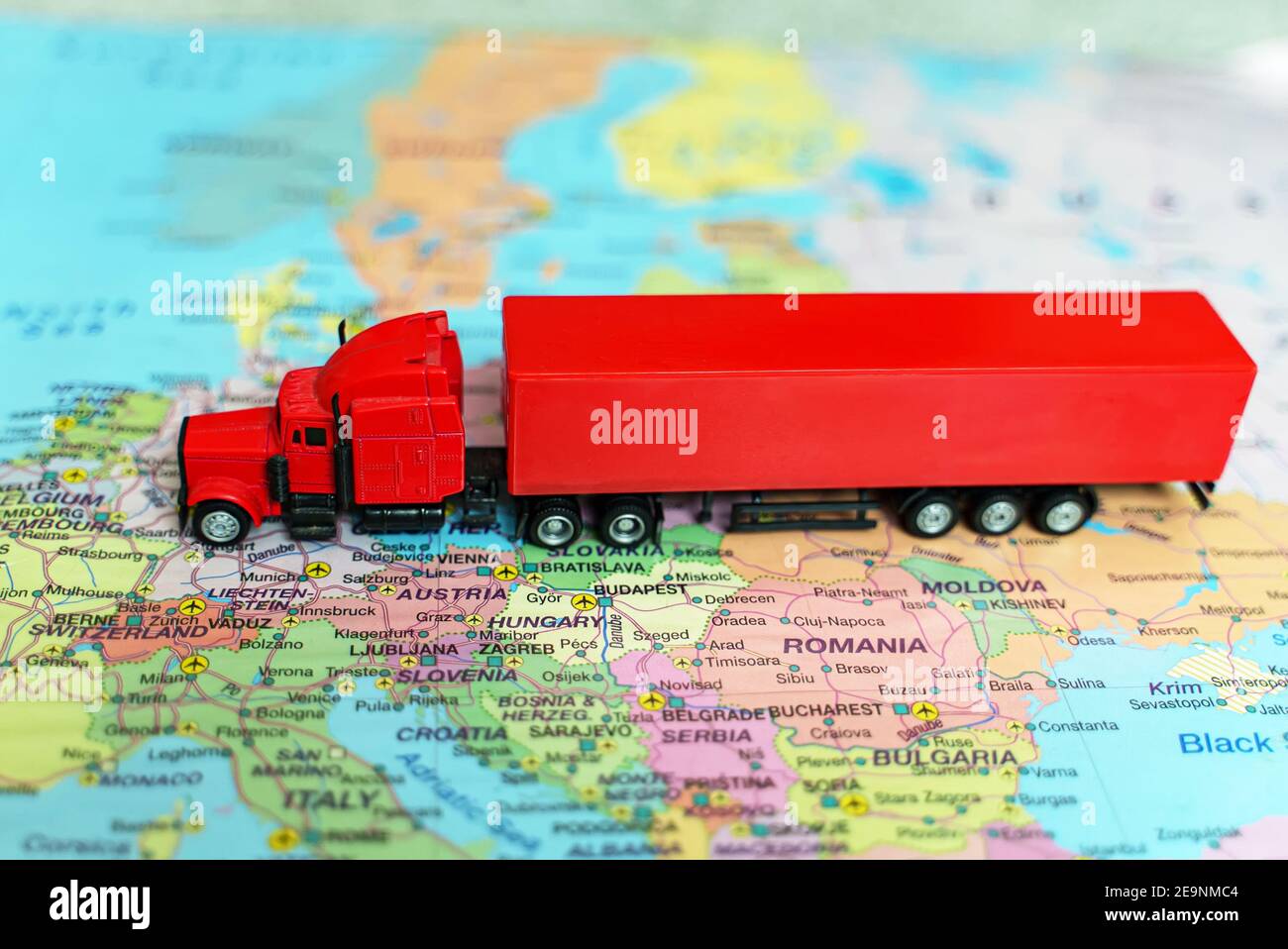 Truck with trailer on the Europe map Stock Photo - Alamy
