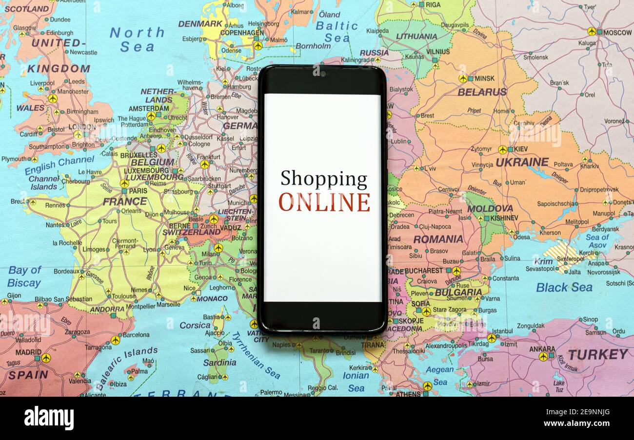 Mobile phone on Europe map. Online shopping concept Stock Photo - Alamy