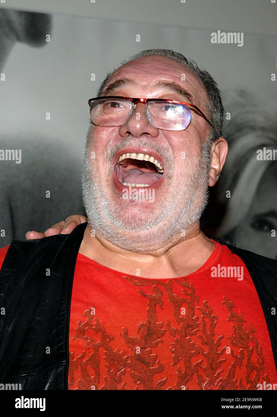 Singer Carlos poses for pictures during a ceremony honoring singer ...