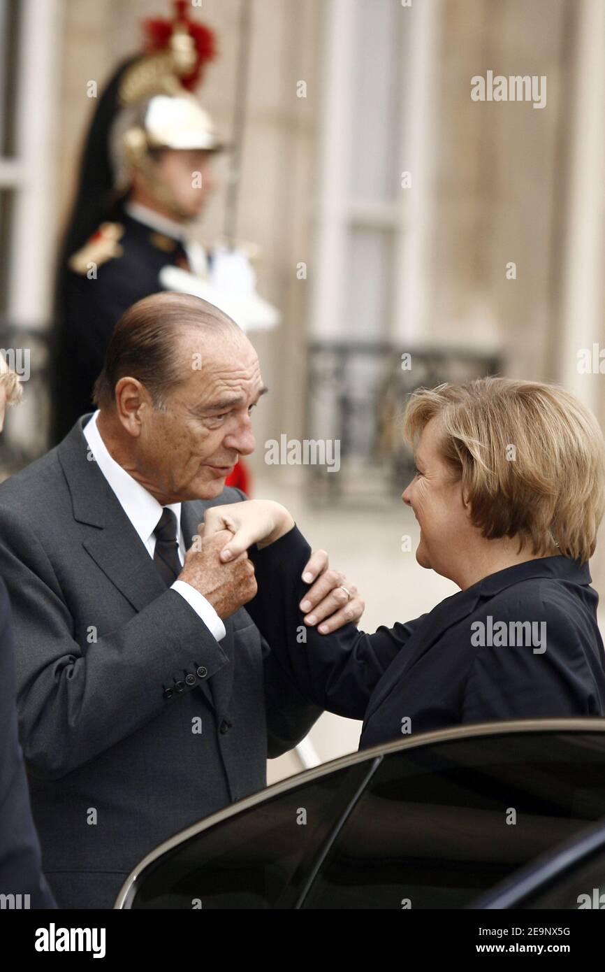 French President Jacques Chirac, welcomes German Chancellor Angela ...