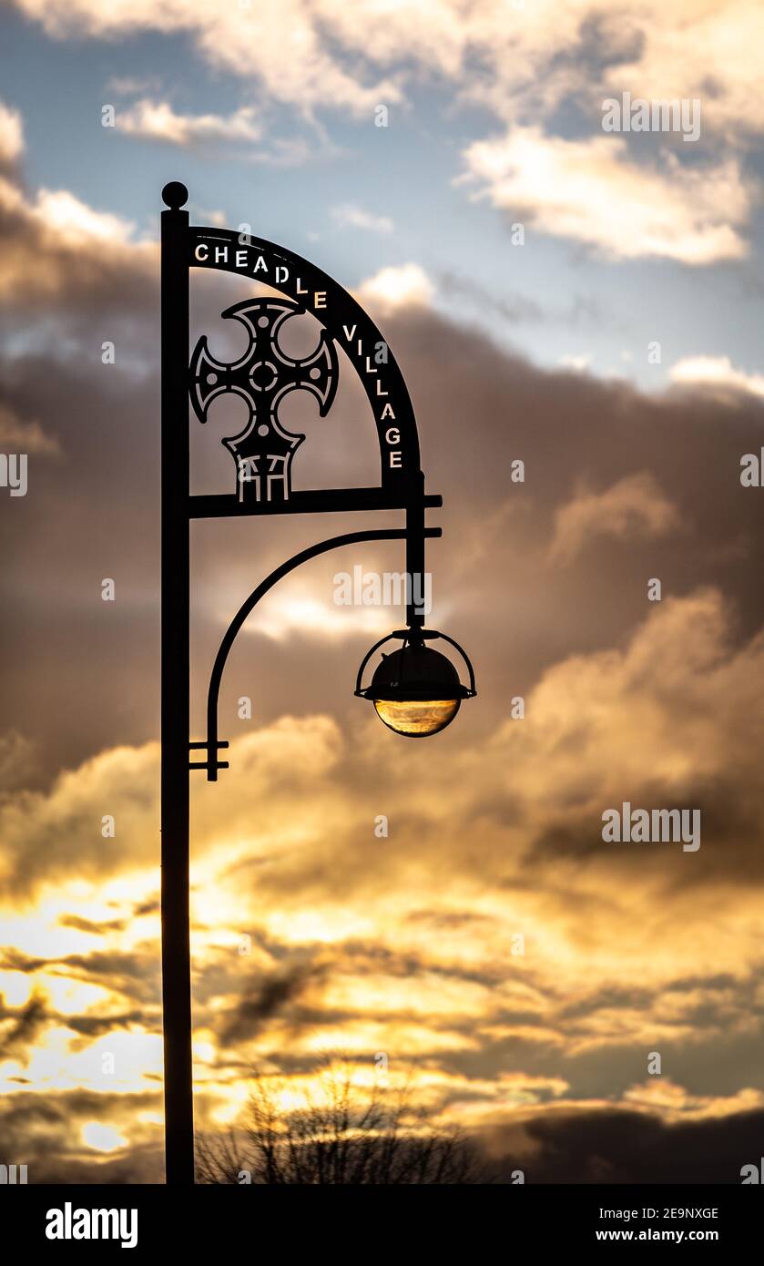A modern Cheadle Village street lamp and sign incorporating an Anglo ...