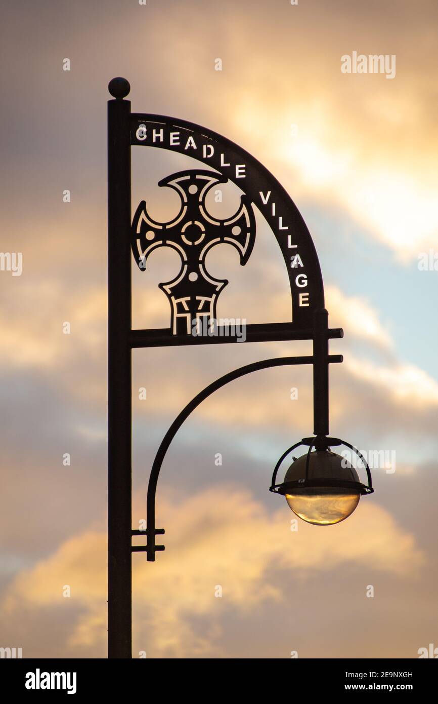 A modern Cheadle Village street lamp and sign incorporating an Anglo ...