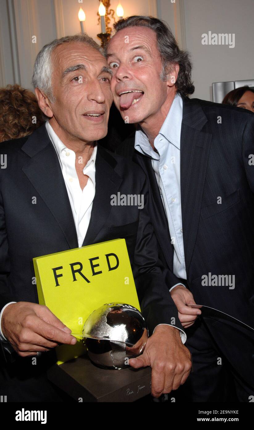 Actor Gerard Darmon poses for pictures with comedian Michel Leeb during ...