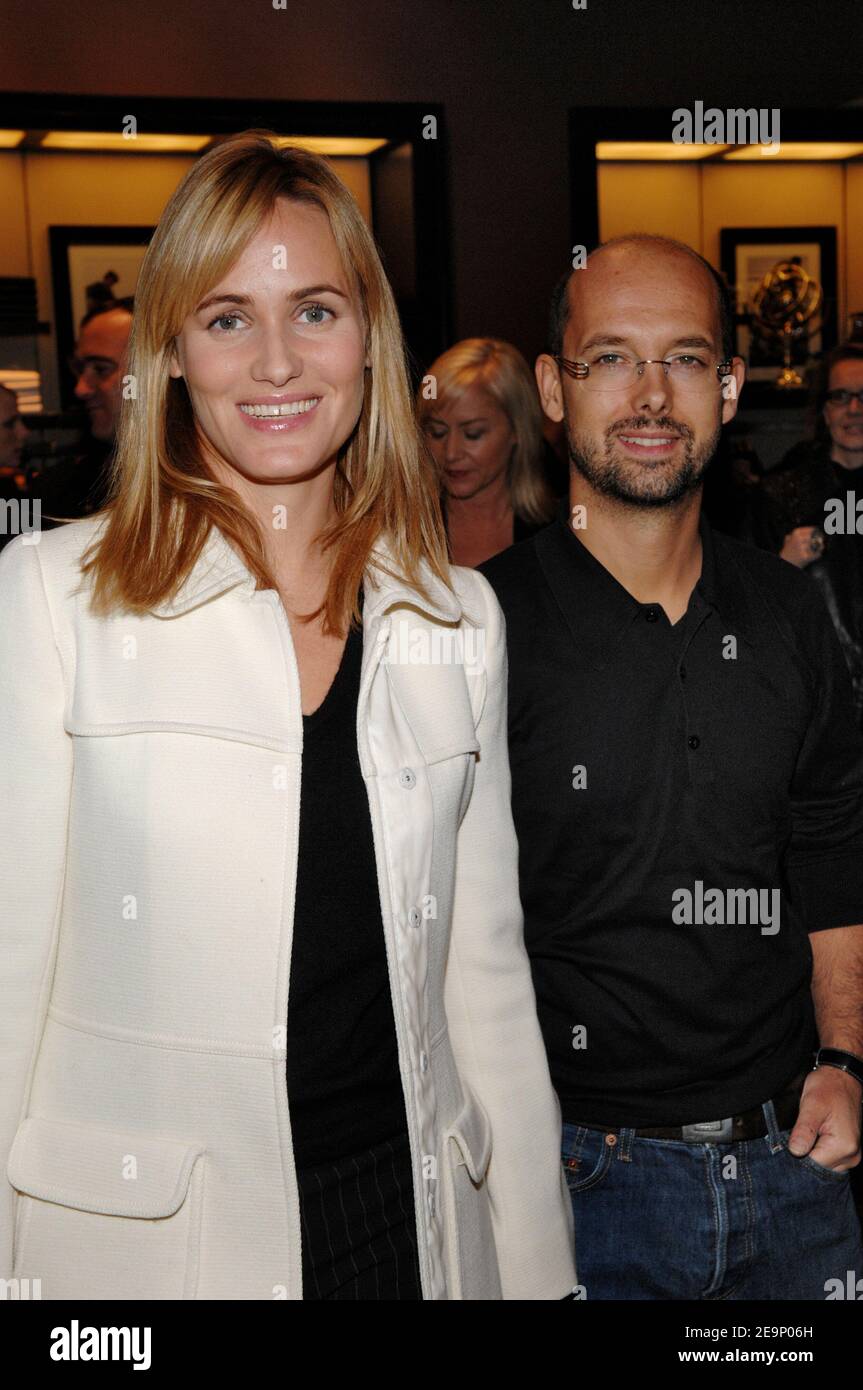 French actress Judith Godreche and her husband Maurice Barthelemy pose ...