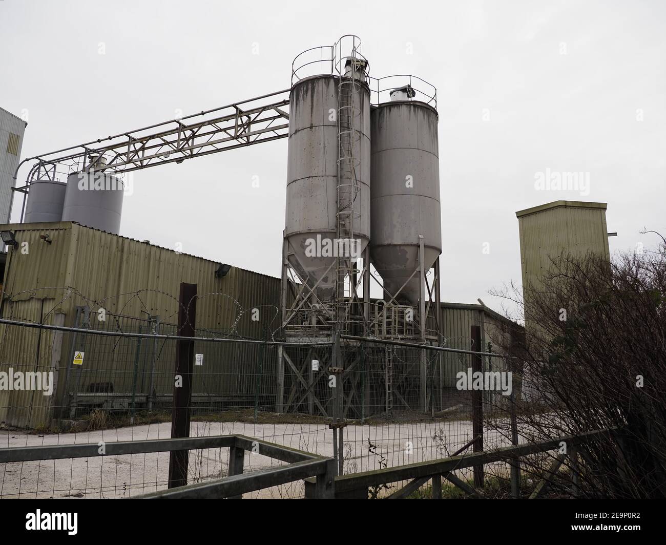 Old rusty tanks of a factory Stock Photo - Alamy
