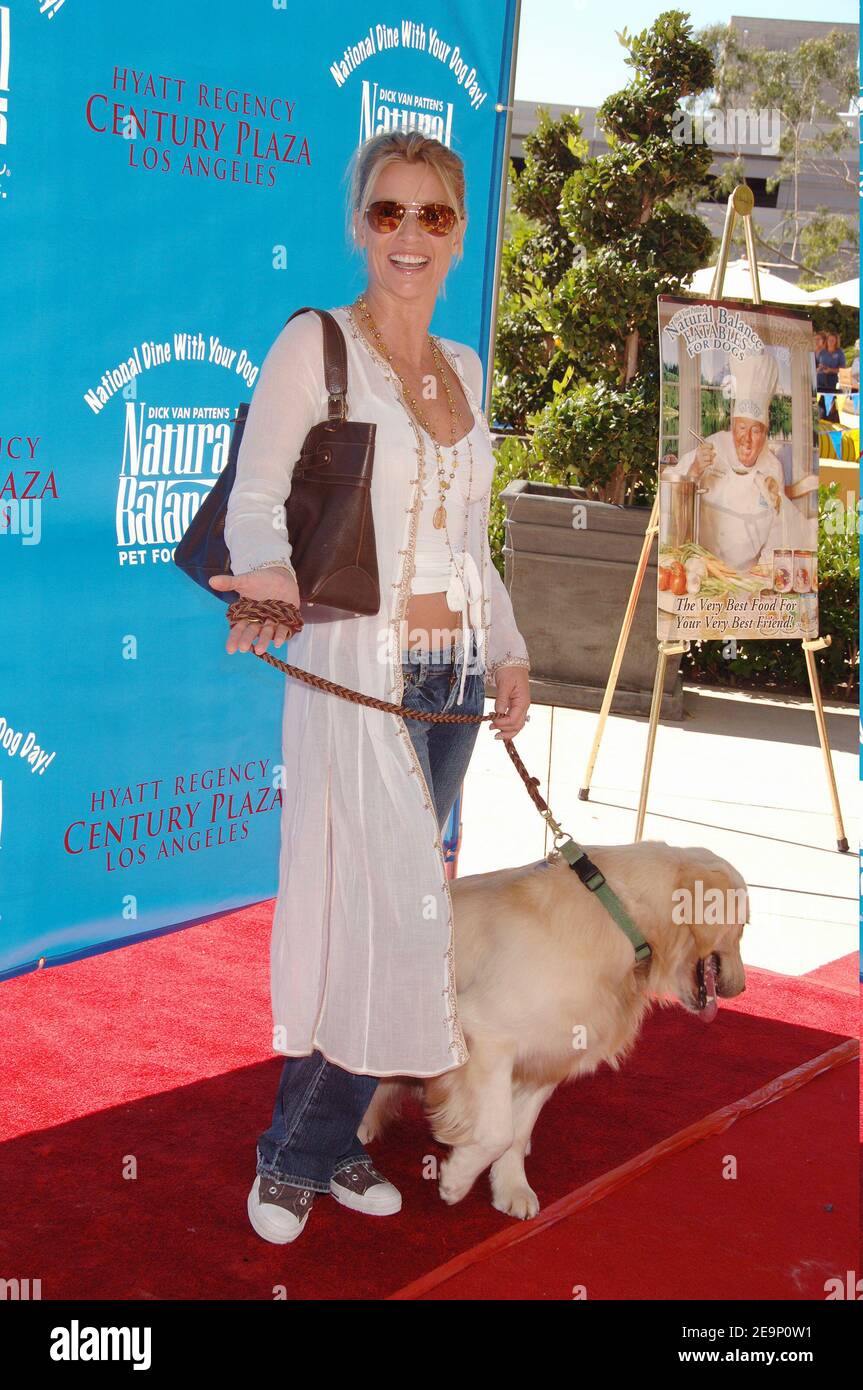 Nicolette Sheridan and her dog Oliver attend the kick off party for ...