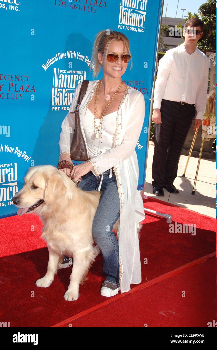 Nicolette Sheridan and her dog Oliver attend the kick off party for ...