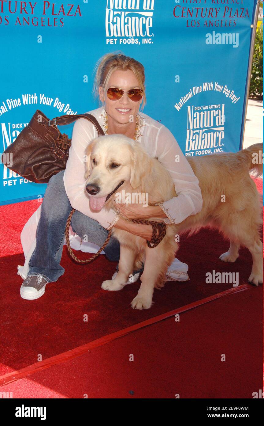 Nicolette Sheridan and her dog Oliver attend the kick off party for ...