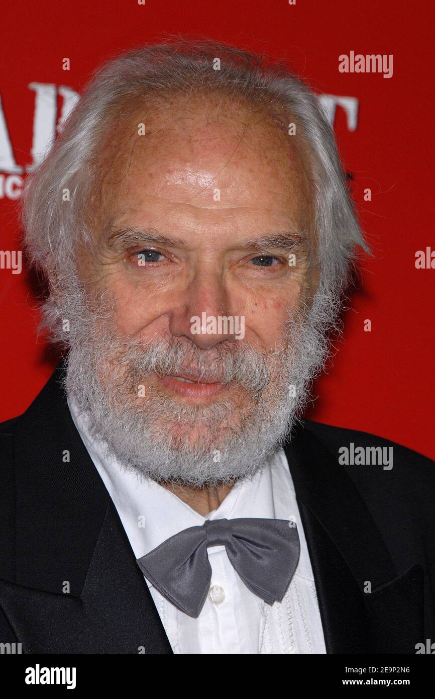 Singer Georges Moustaki poses for pictures during the Gala premiere for ...