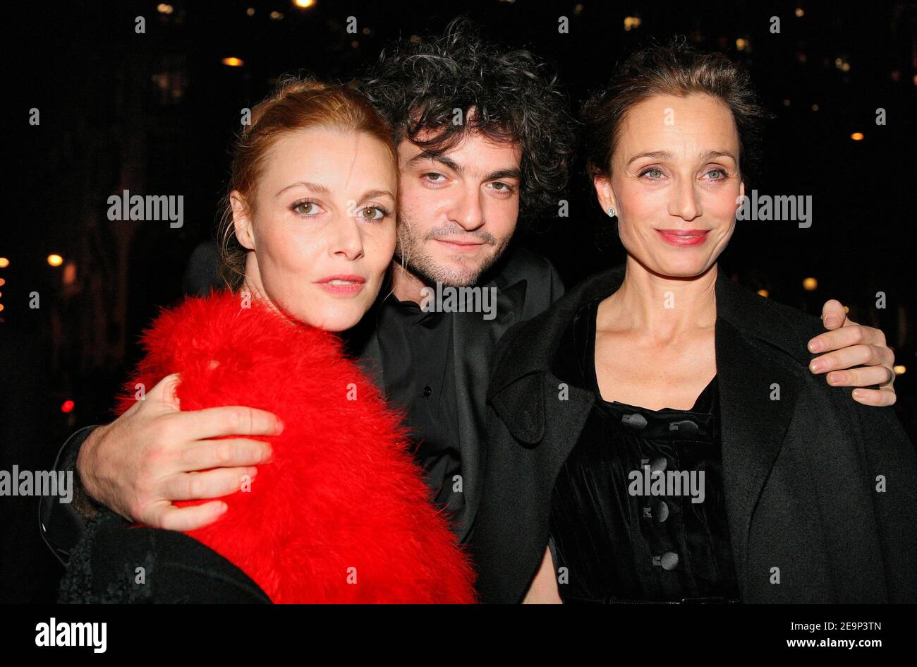French singer Mathieu Chedid surrounded by Florence Thomassin (l) and ...