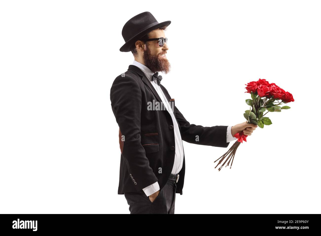 Man giving a bouquet of red roses isolated on white background Stock ...